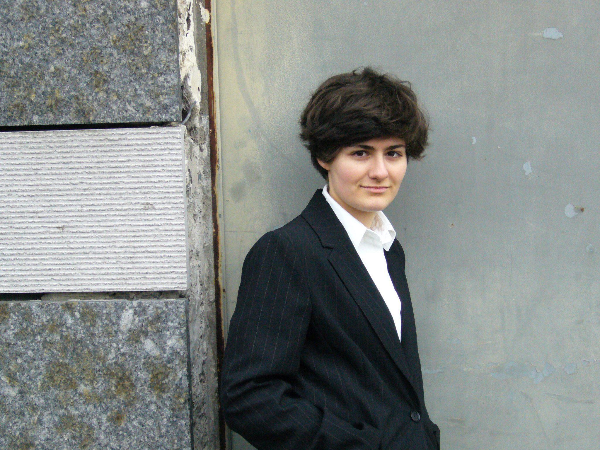 BIOGRAPHY – ESTHER ASSUIED